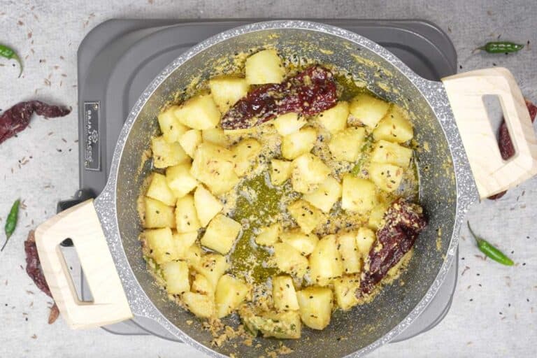 Aloo Posto Recipe (Bengali Poppy Seed Potato Fry) - Whiskaffair